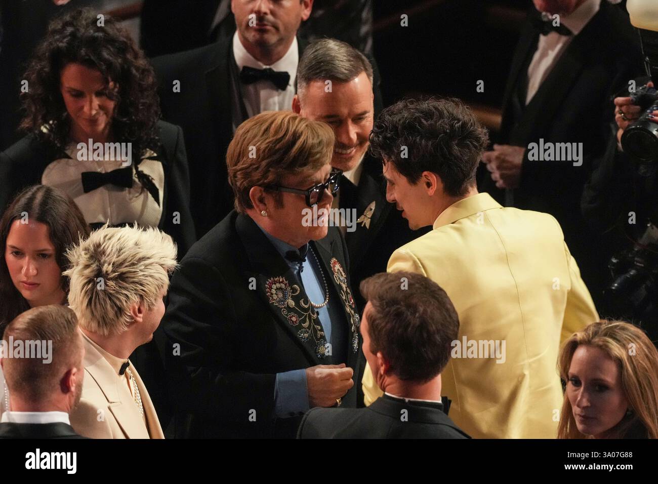 Elton John, left, and Timothee Chalamet in the audience during the ...