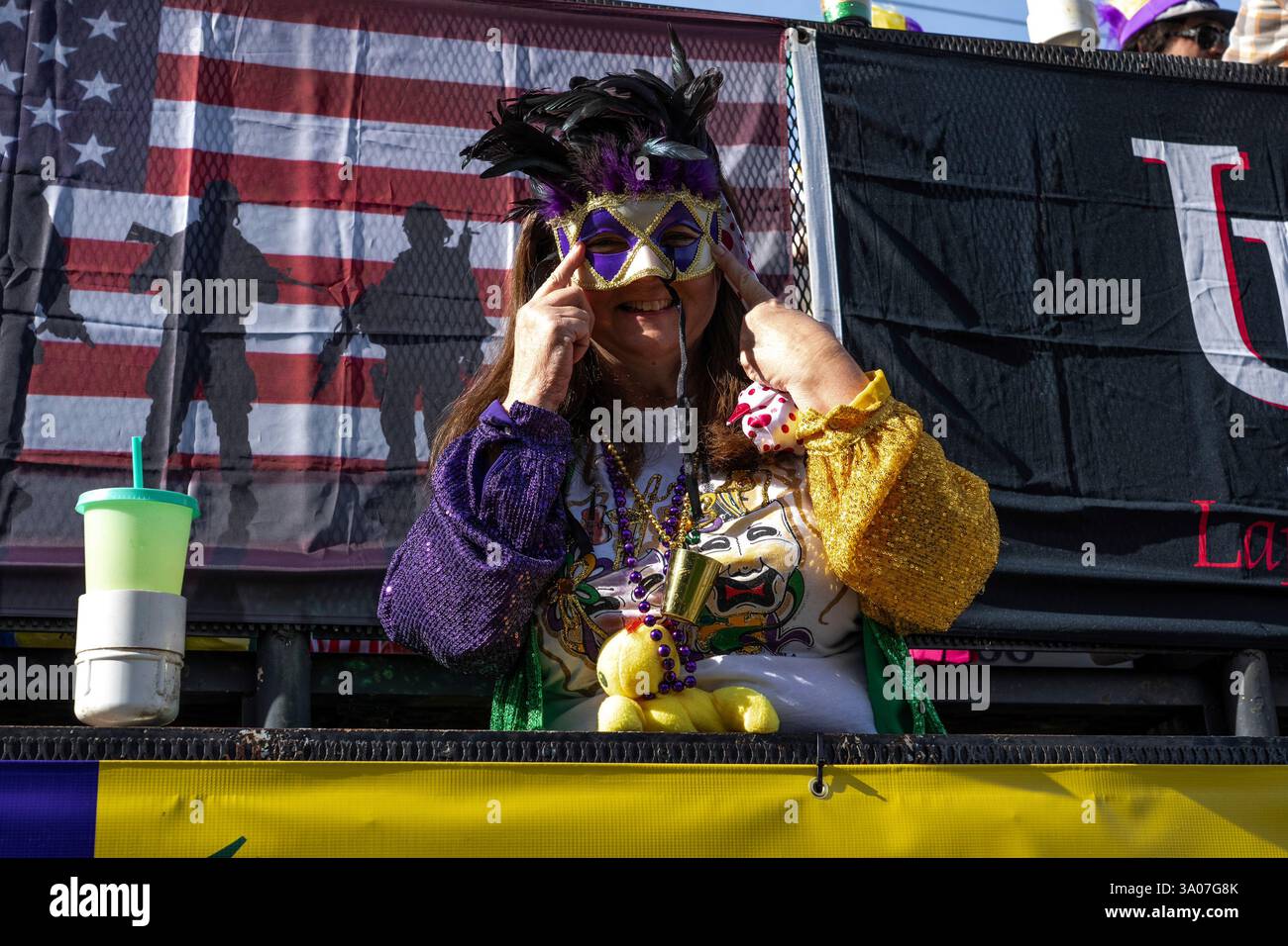Parade participants are seen during the Church Point Courir de Mardi ...