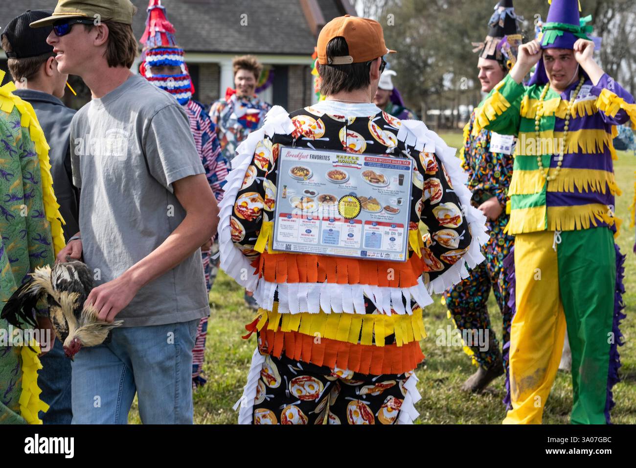 Parade participants are seen during the Church Point Courir de Mardi ...