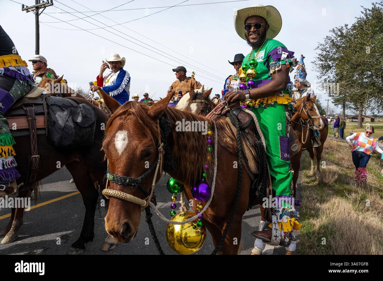 Parade participants are seen during the Church Point Courir de Mardi ...