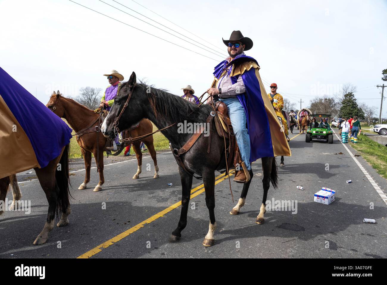 Parade participants are seen during the Church Point Courir de Mardi ...