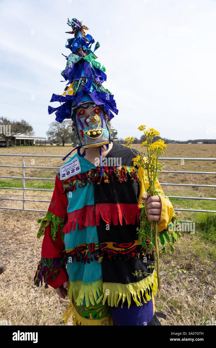 Parade participants are seen during the Church Point Courir de Mardi ...