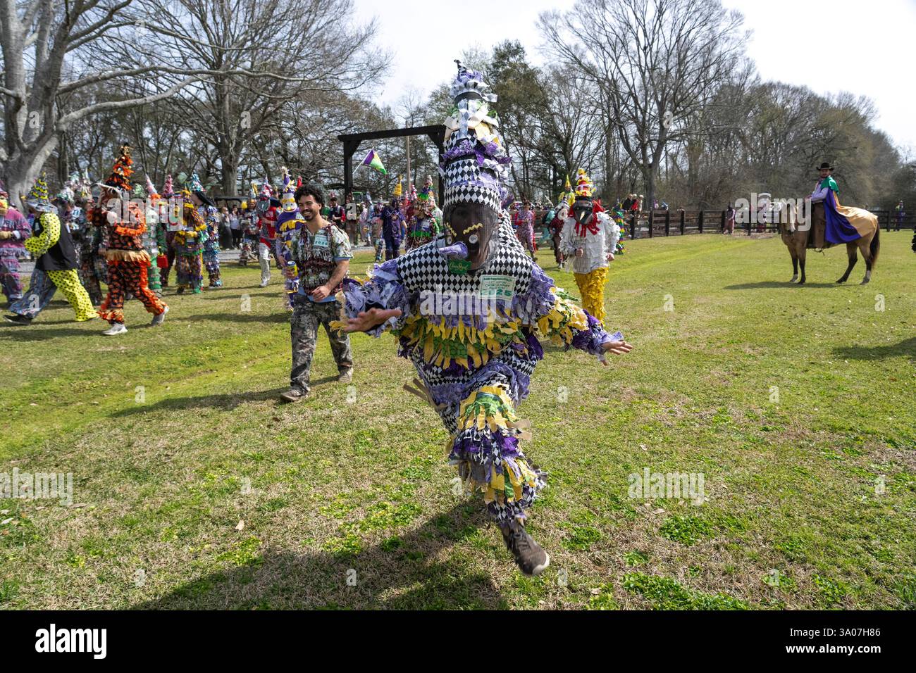 Parade participants are seen during the Church Point Courir de Mardi ...