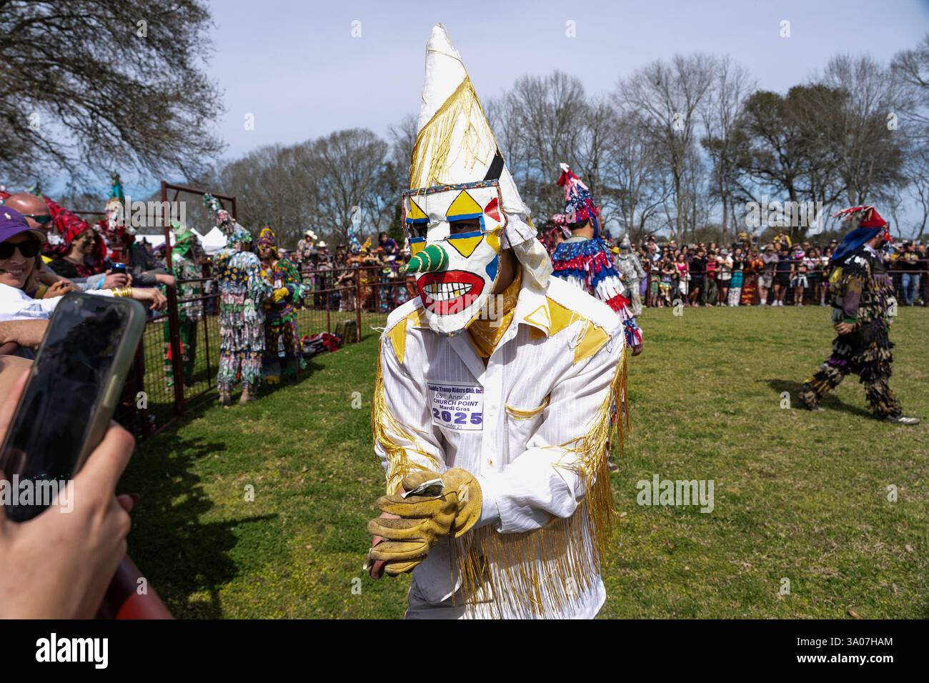Parade participants are seen during the Church Point Courir de Mardi ...