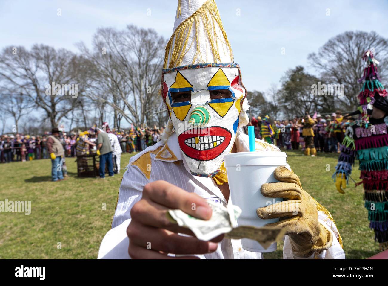 Parade participants are seen during the Church Point Courir de Mardi ...
