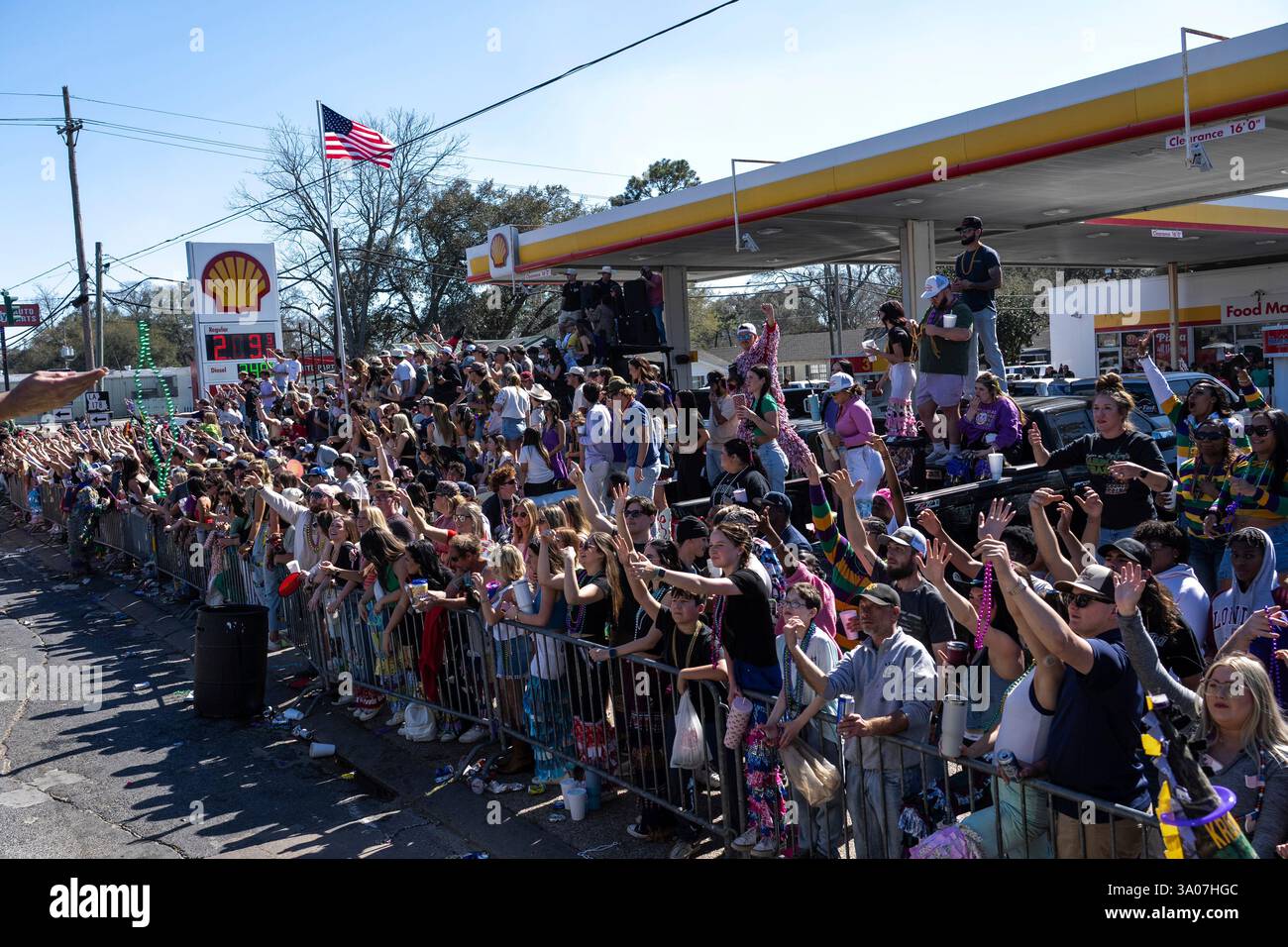 Paradegoers are seen during the Church Point Courir de Mardi Gras ...