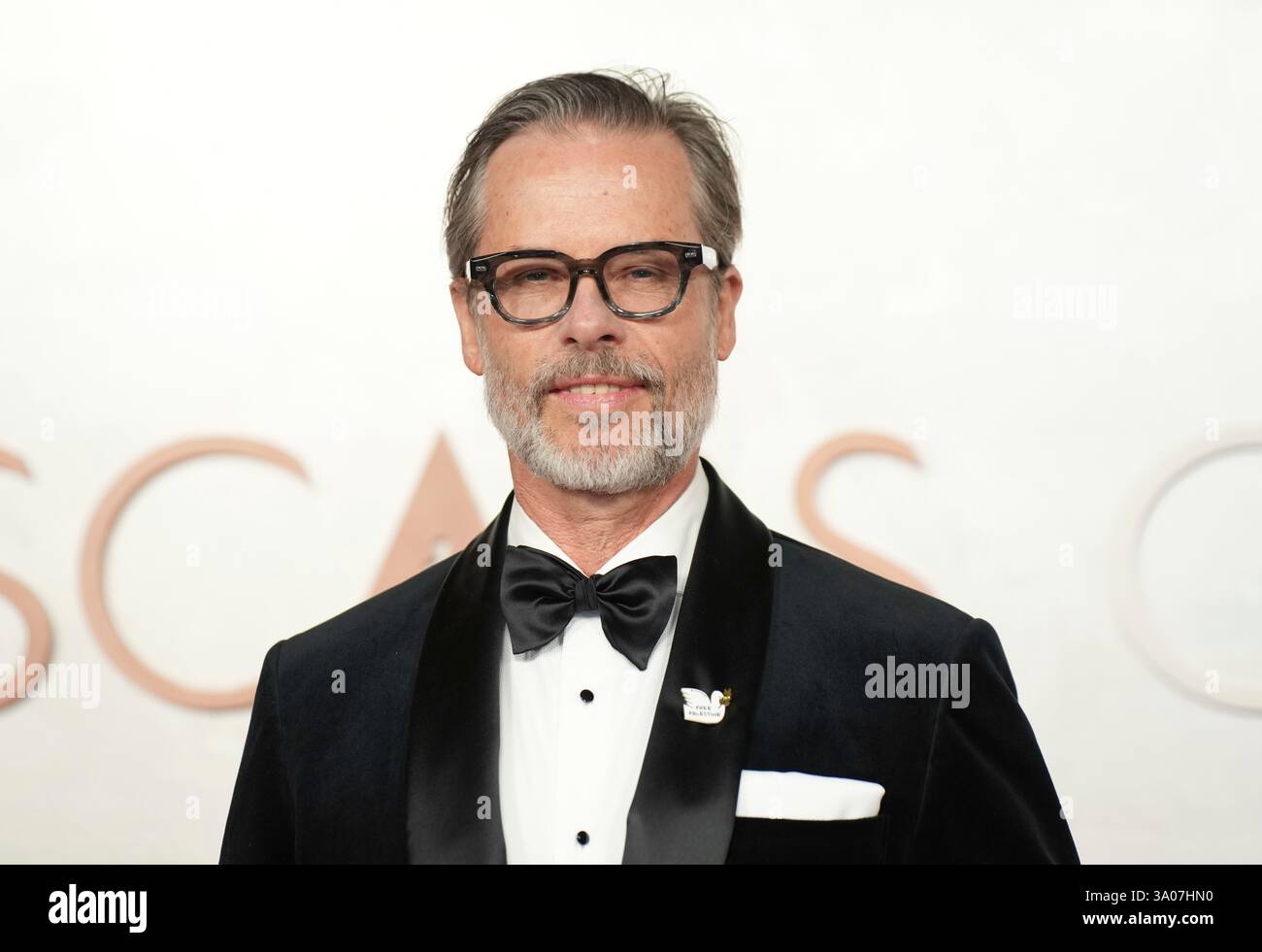 Guy Pearce arrives at the Oscars on Sunday, March 2, 2025, at the Dolby ...