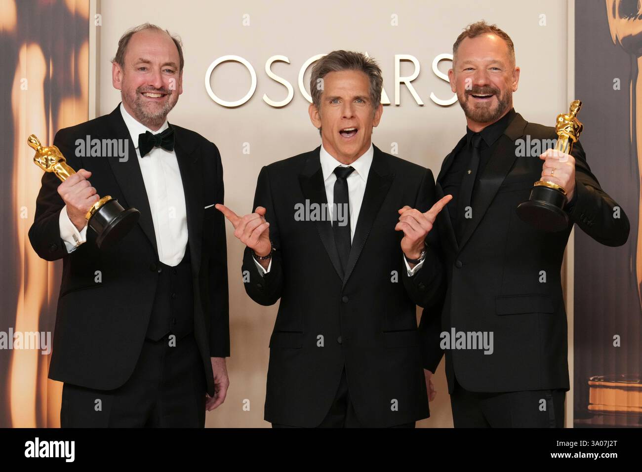 Nathan Crowley, left, and Lee Sandales, right, winners of the award for ...