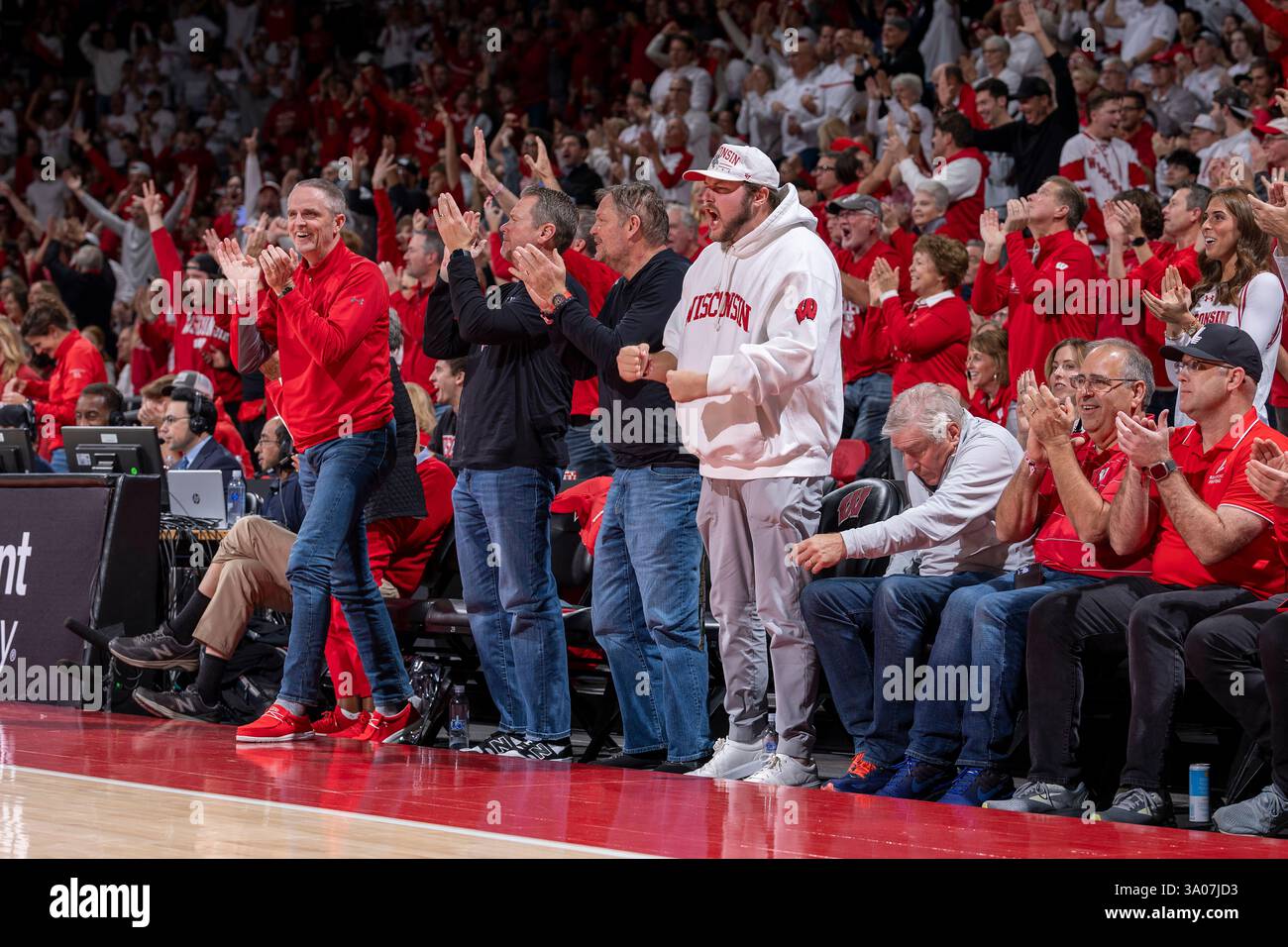 Wisconsin Badger fans celebrate during an NCAA college men's basketball ...
