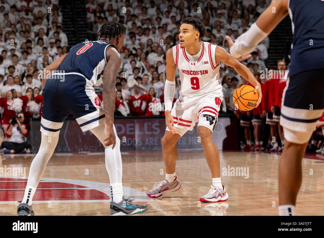 Wisconsin Badgers guard John Tonje (9) handles the ball during an NCAA ...