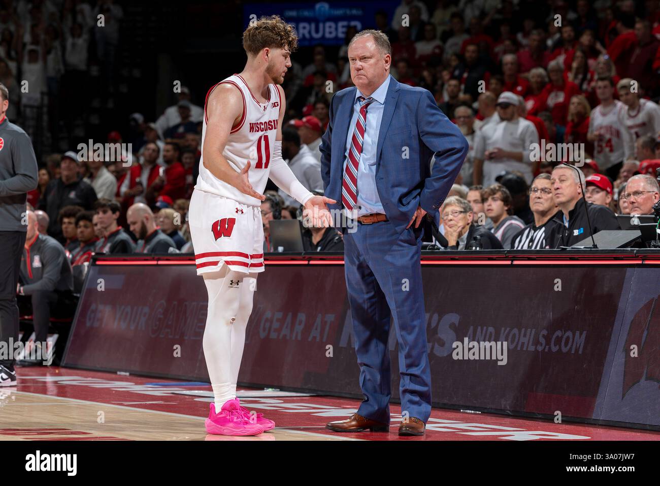 Wisconsin Badgers Head Coach Greg Gard looks on during an NCAA college ...