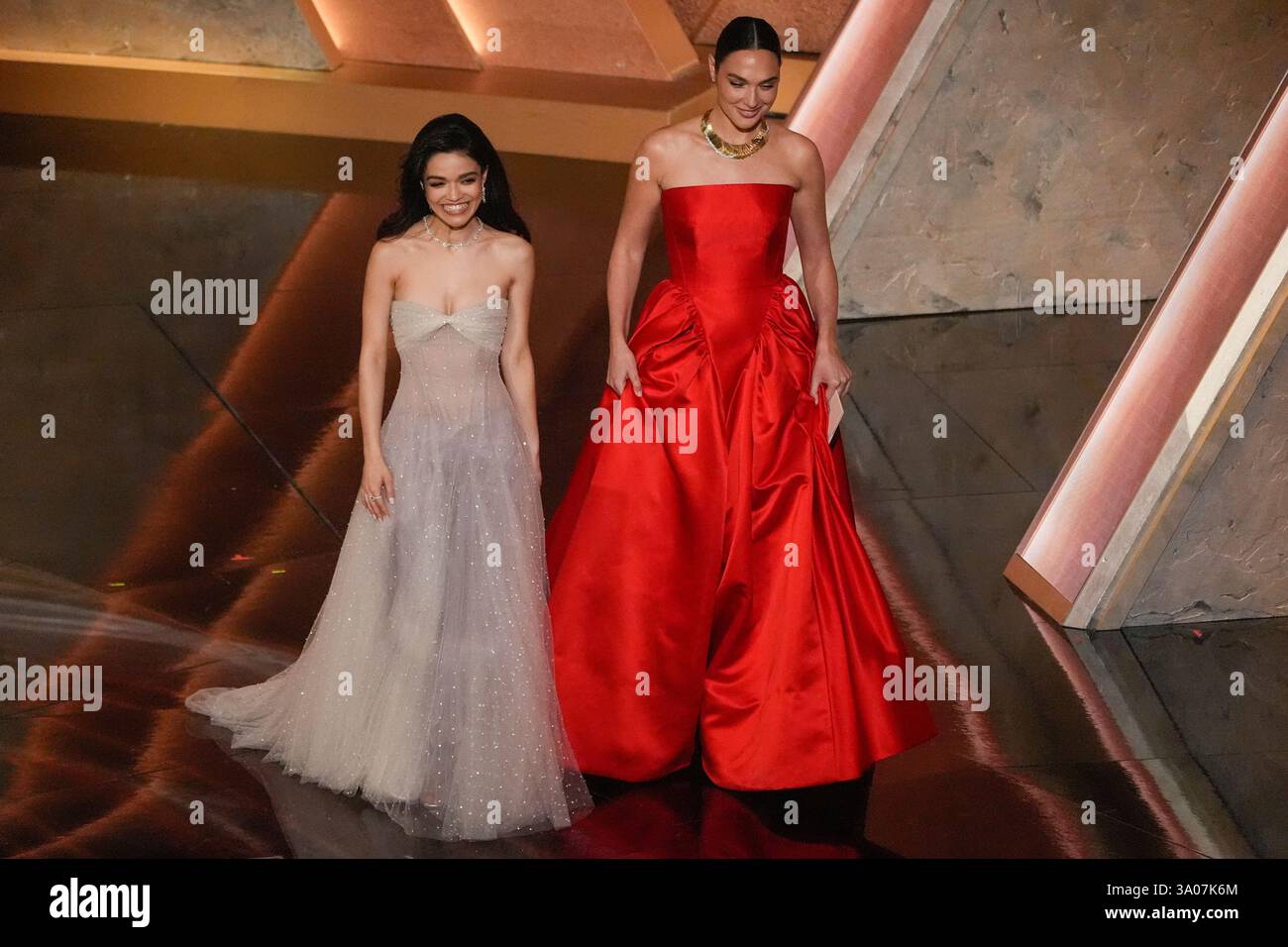 Rachel Zegler, left, and Gal Gadot present the award for best visual ...