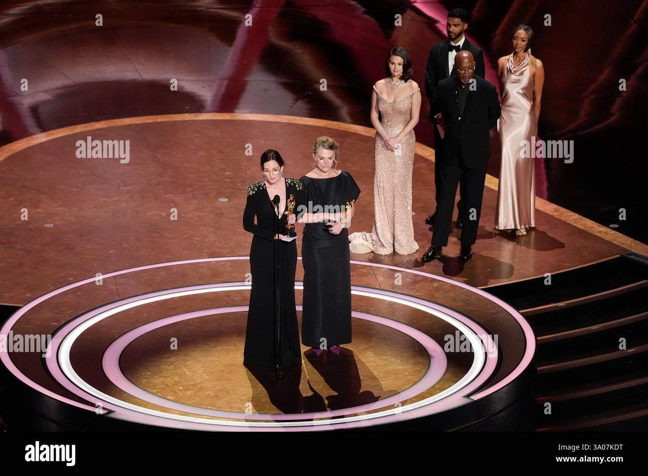 Molly O'Brien, left, and Lisa Remington accept the award for best ...