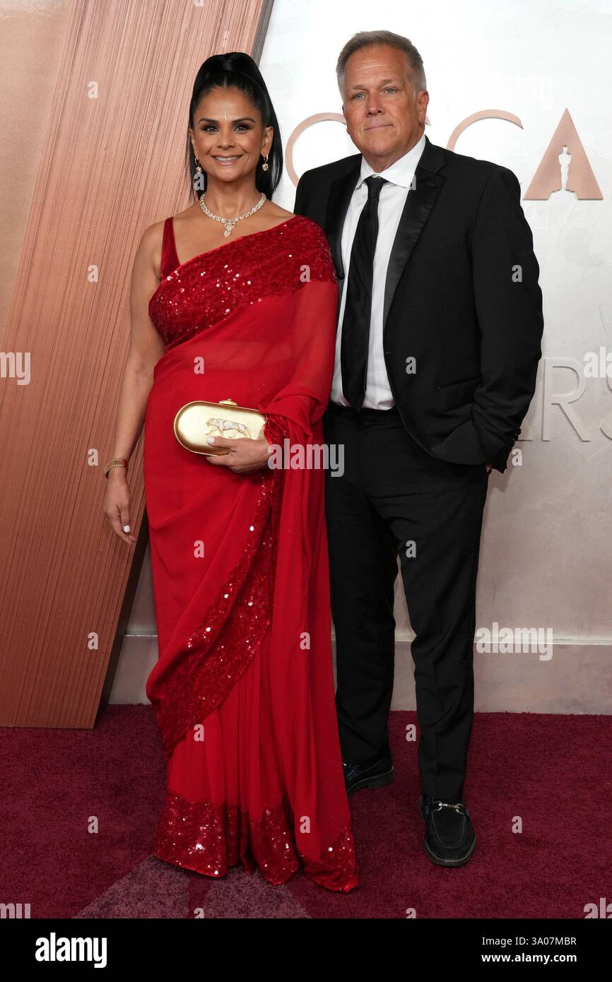 Bela Bajaria, left, and Doug Prochilo arrive at the Oscars on Sunday ...
