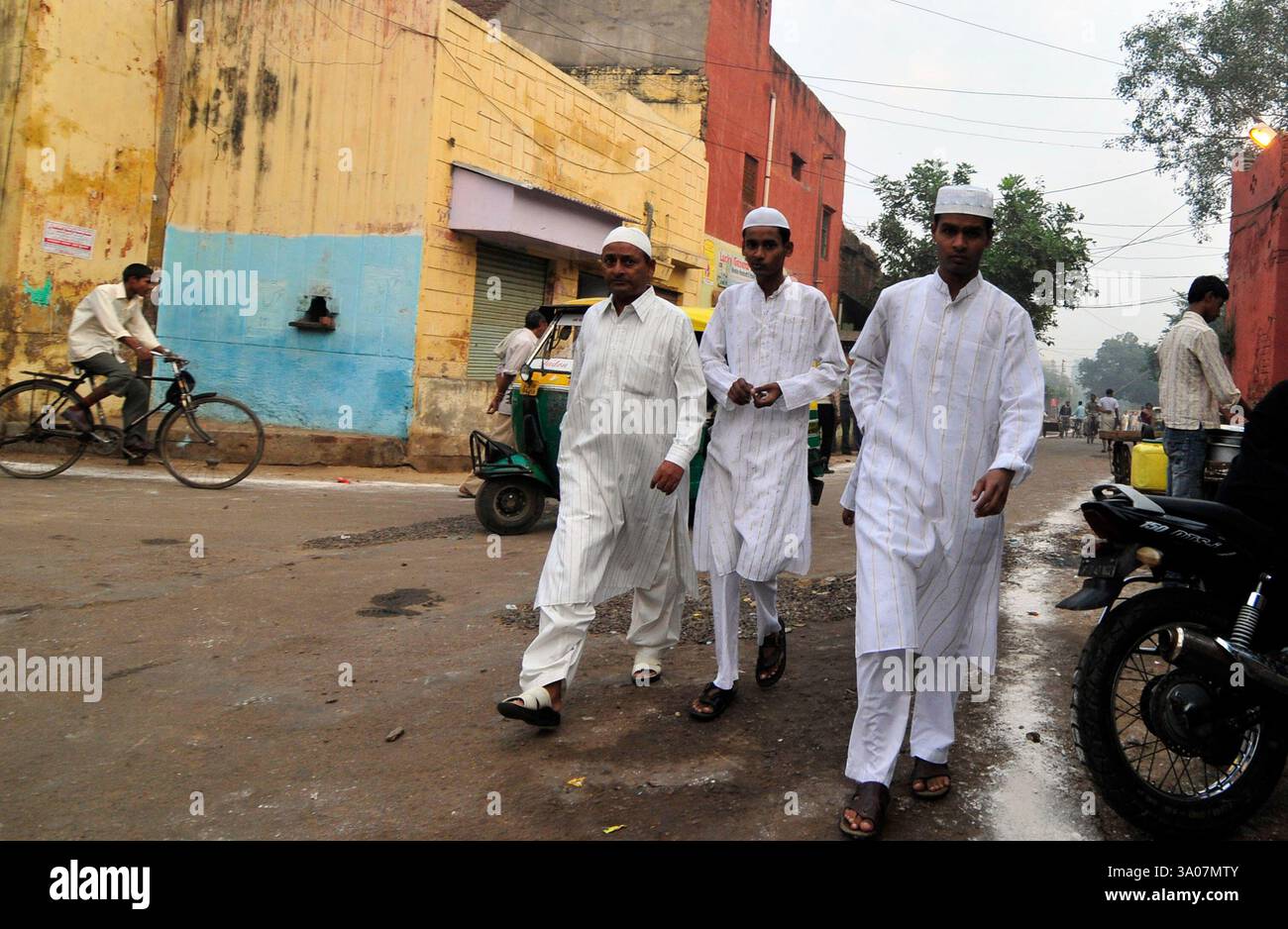 Indian Muslim men dressed for the Eid ul Zuha festival in Agra, India ...