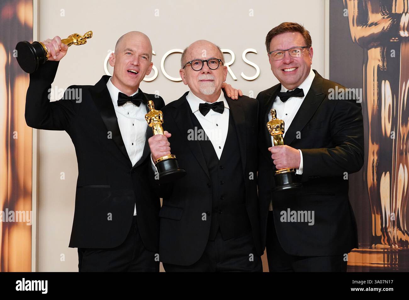 CORRECTS NAMES OF PEOPLE SHOWN - Gareth John, from left, Richard King ...