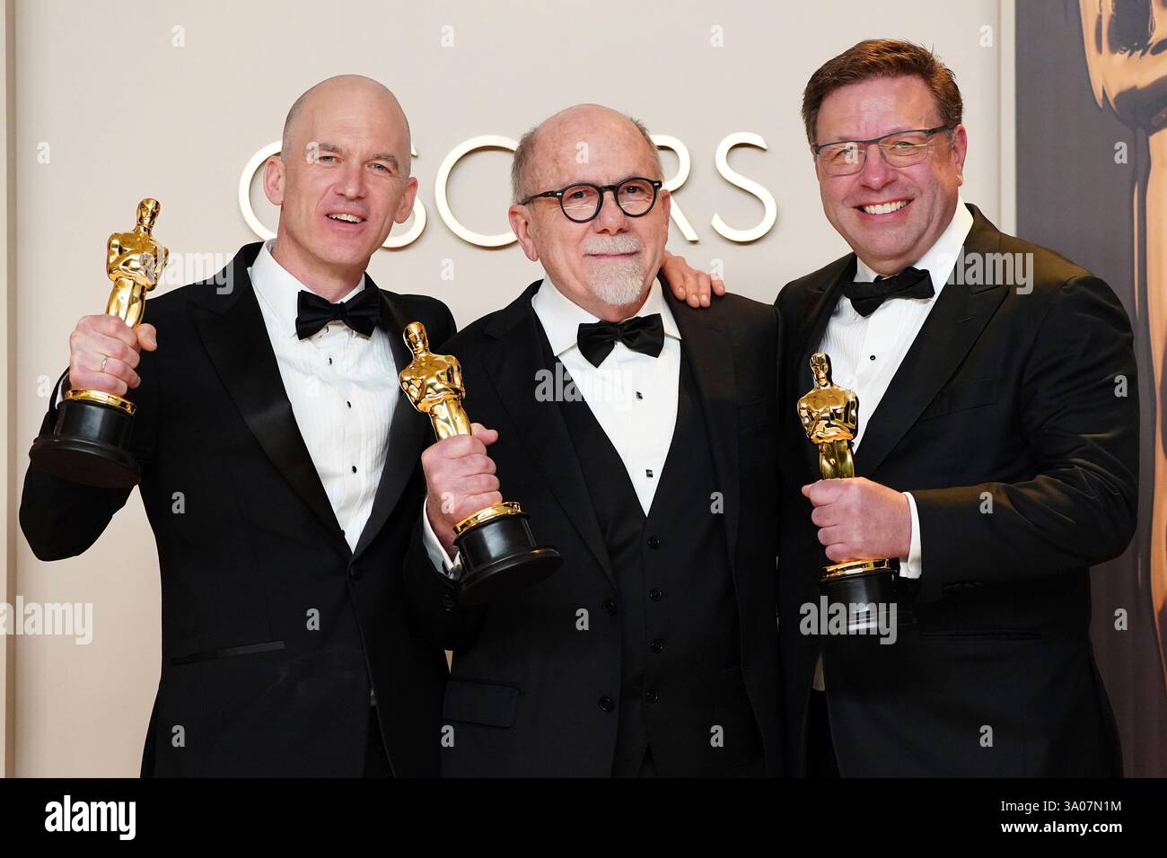 Gareth John, from left, Richard King, and Ron Bartlett, winners of the award for best sound for ...