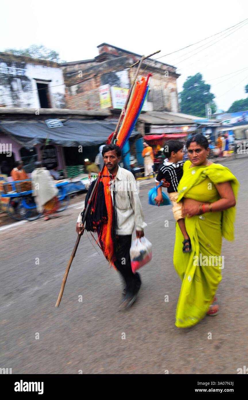 Pilgrims walk between temples in Ayodhya, Uttar Pradesh, India Stock ...
