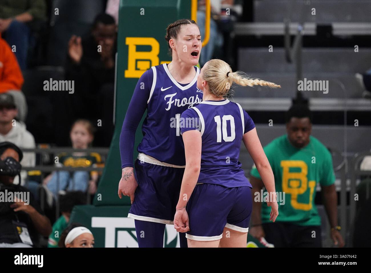 TCU's Sedona Prince, left, and Hailey Van Lith (10) celebrate after a ...
