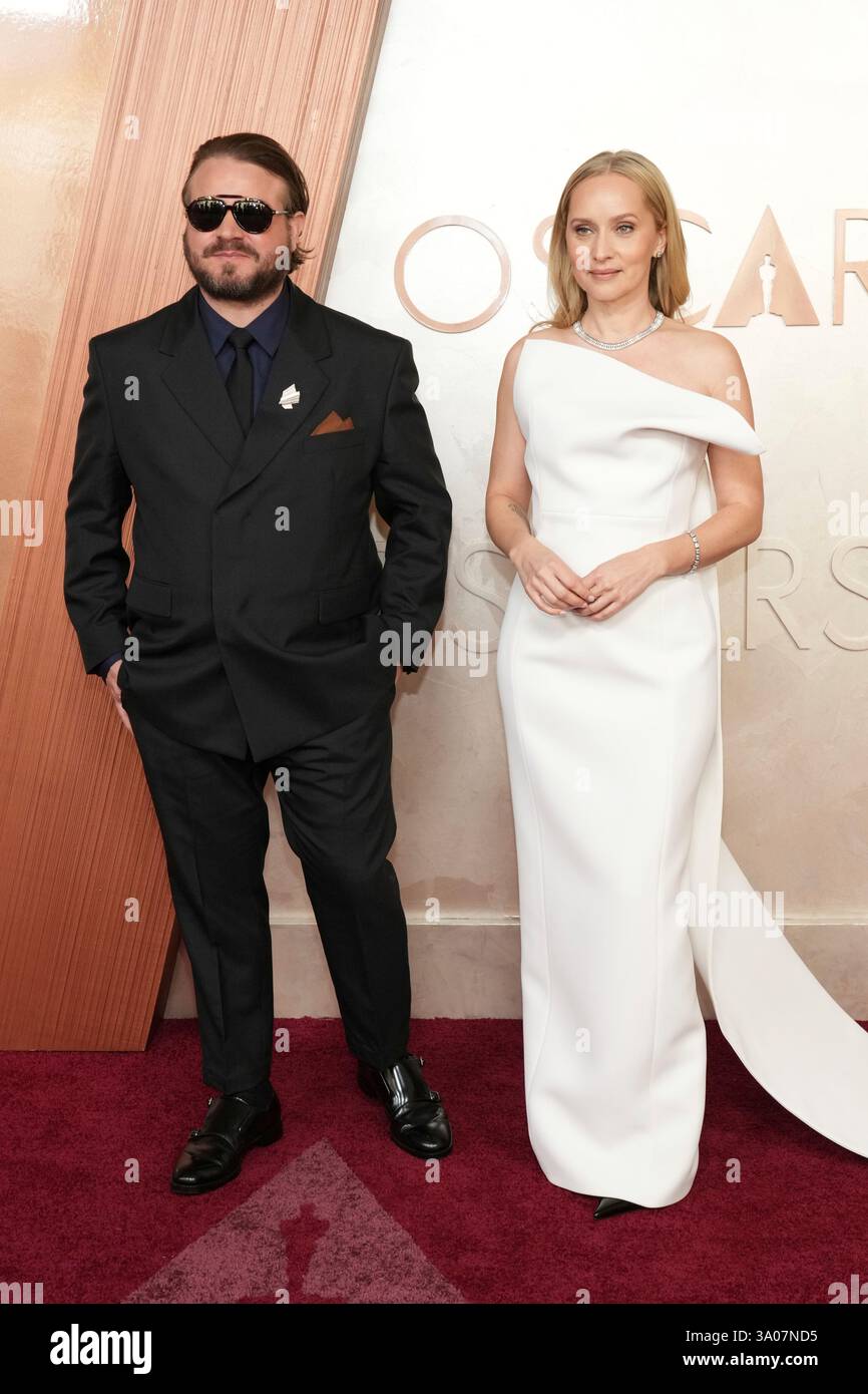 Brady Corbet, left, Mona Fastvold arrive at the Oscars on Sunday, March ...