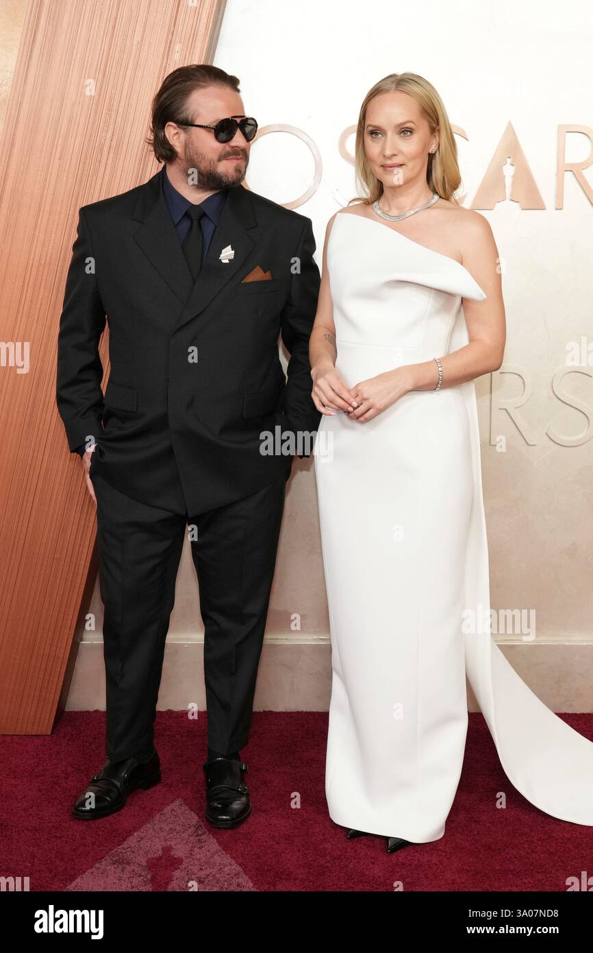 Brady Corbet, left, Mona Fastvold arrive at the Oscars on Sunday, March ...