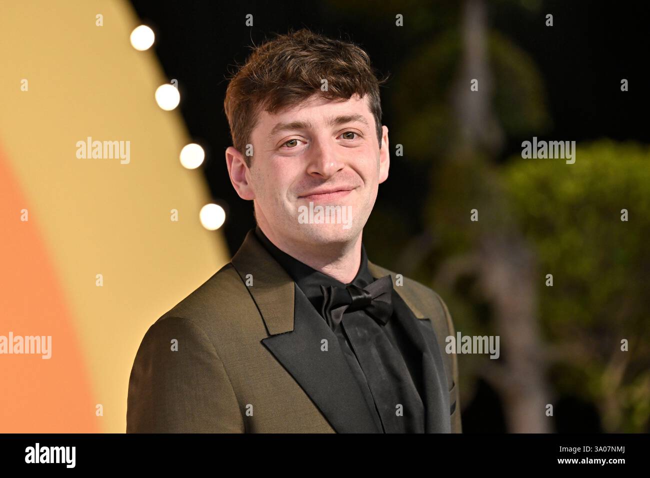 Alex Edelman arrives at the Vanity Fair Oscar Party on Sunday, March 2 ...