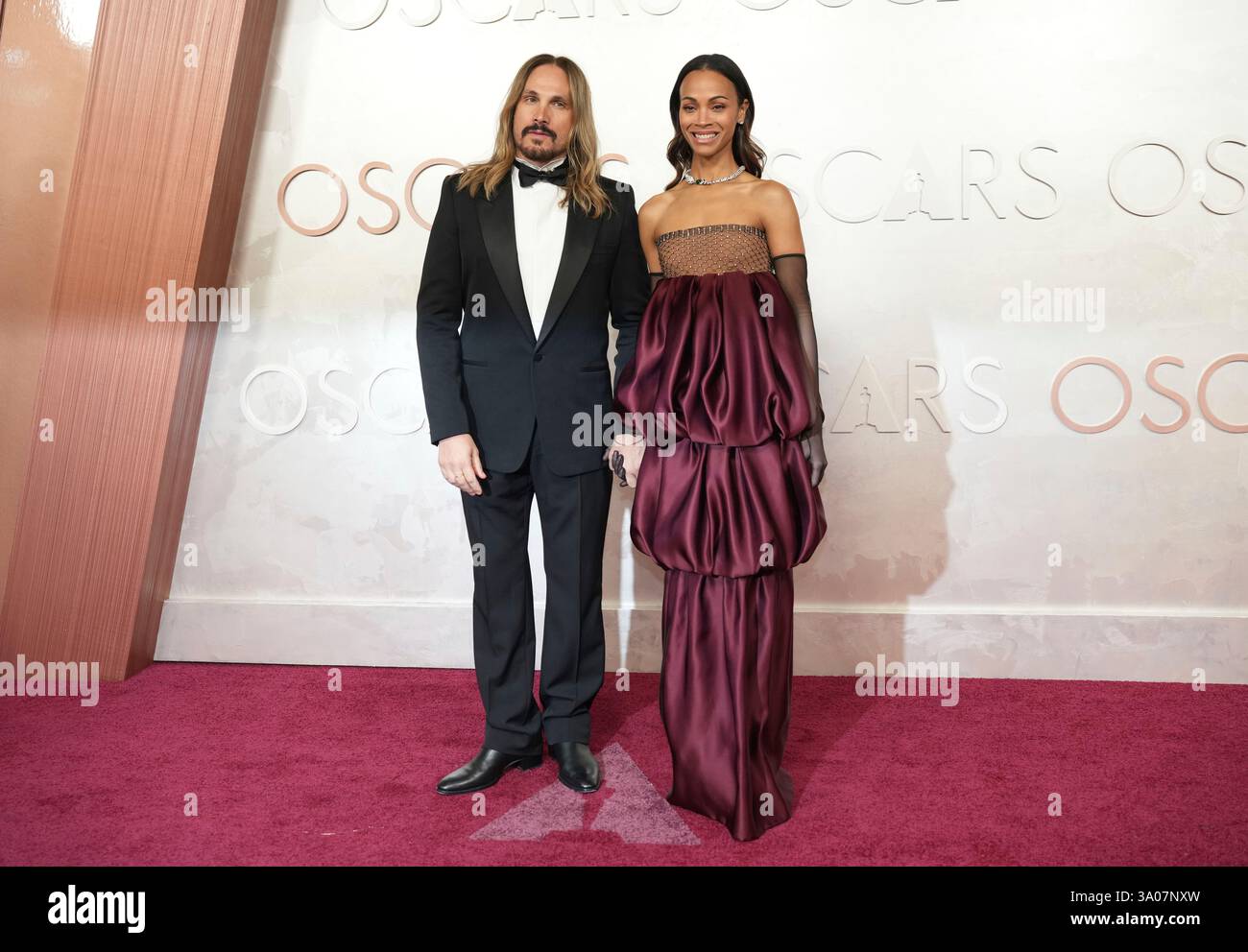 Marco Perego-Saldana, left, and Zoe Saldana arrive at the Oscars on ...