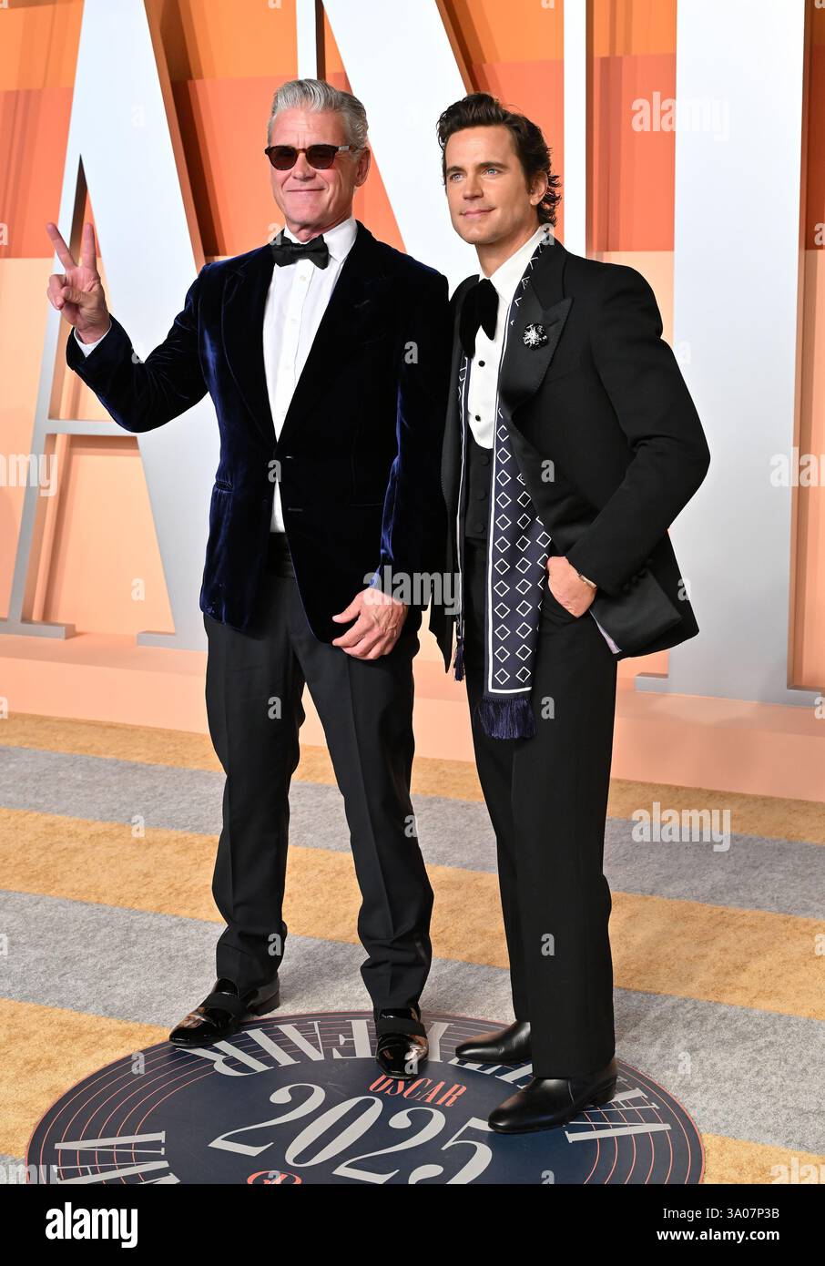 Beverly Hills, USA. 02nd Mar, 2025. Simon Hall and Matt Bomer arriving at the Vanity Fair Oscar ...