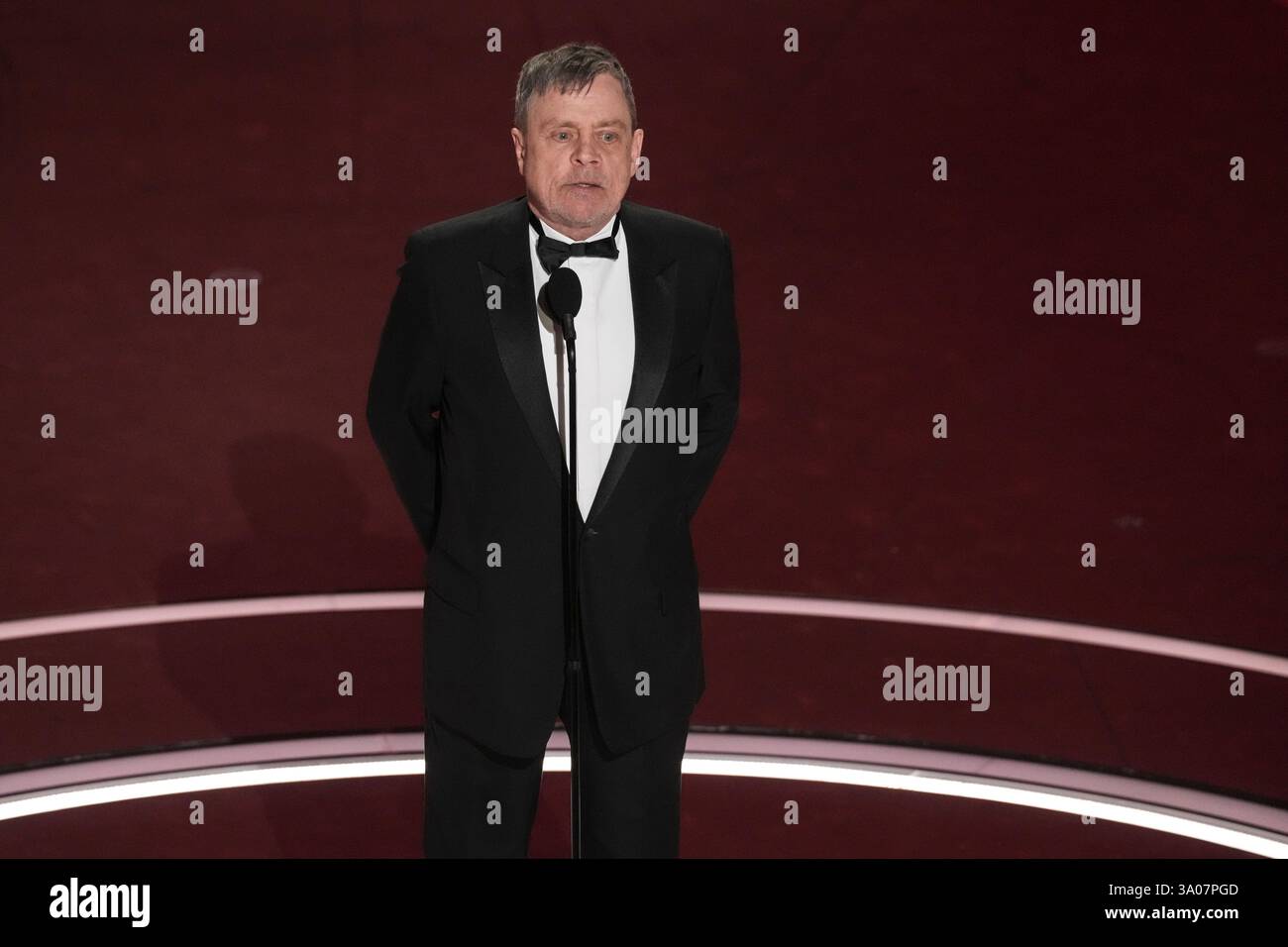 Mark Hamill presents the award for best original score during the ... Mark Hamill presents the award for best original score during the ...