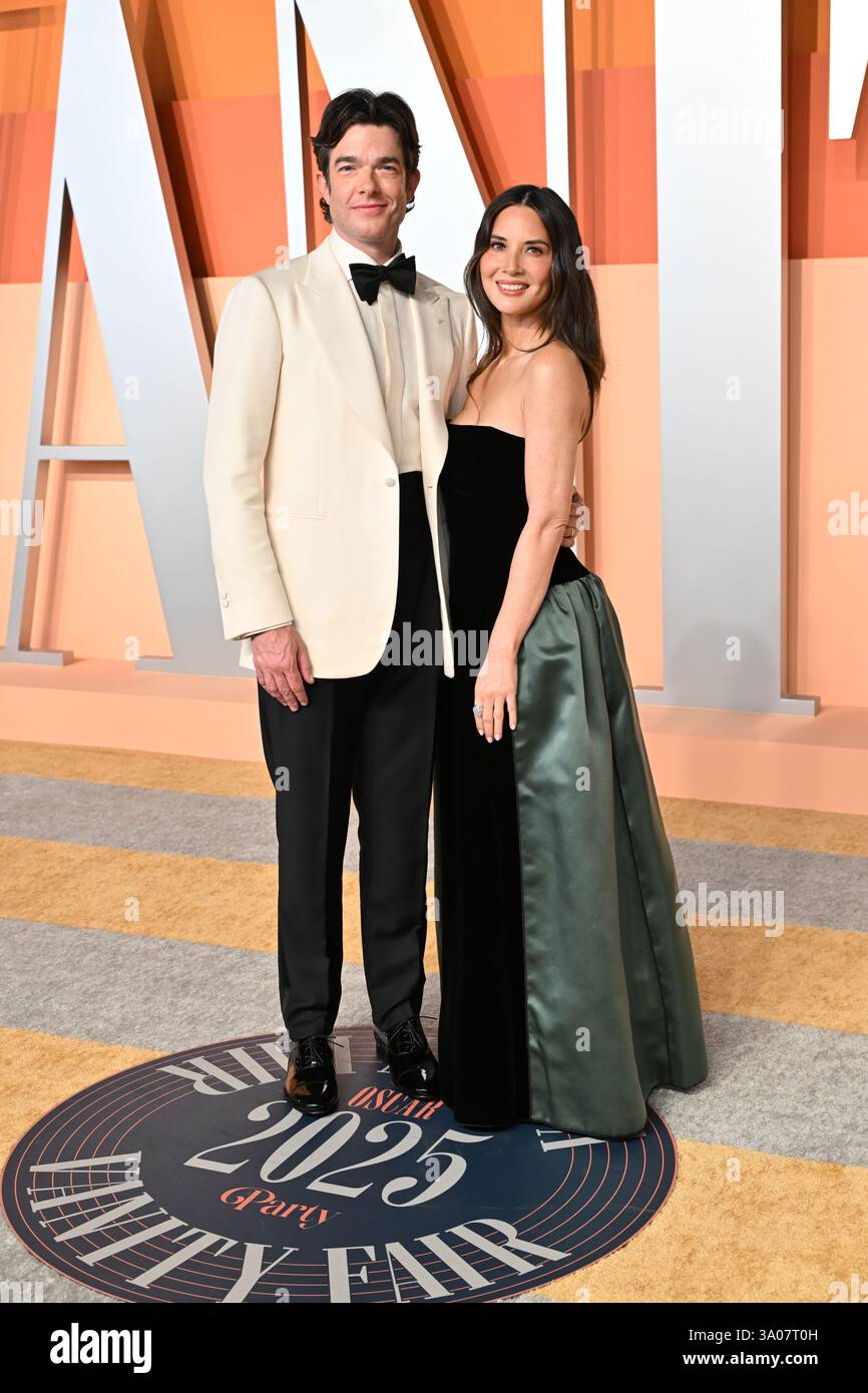 John Mulaney and Olivia Munn arriving at the Vanity Fair Oscar Party ...