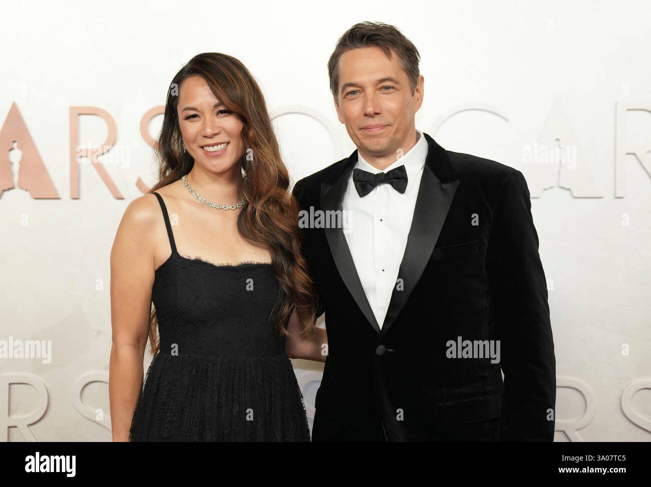 Samantha Quan, left, and Sean Baker arrive at the Oscars on Sunday ...