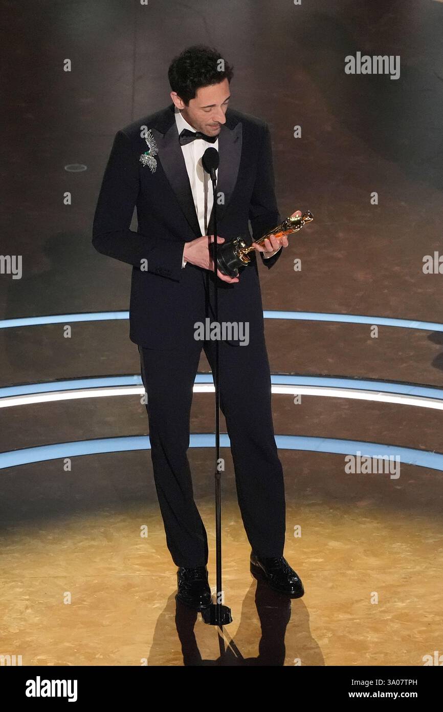 Adrien Brody accepts the award for best performance by an actor in a ...