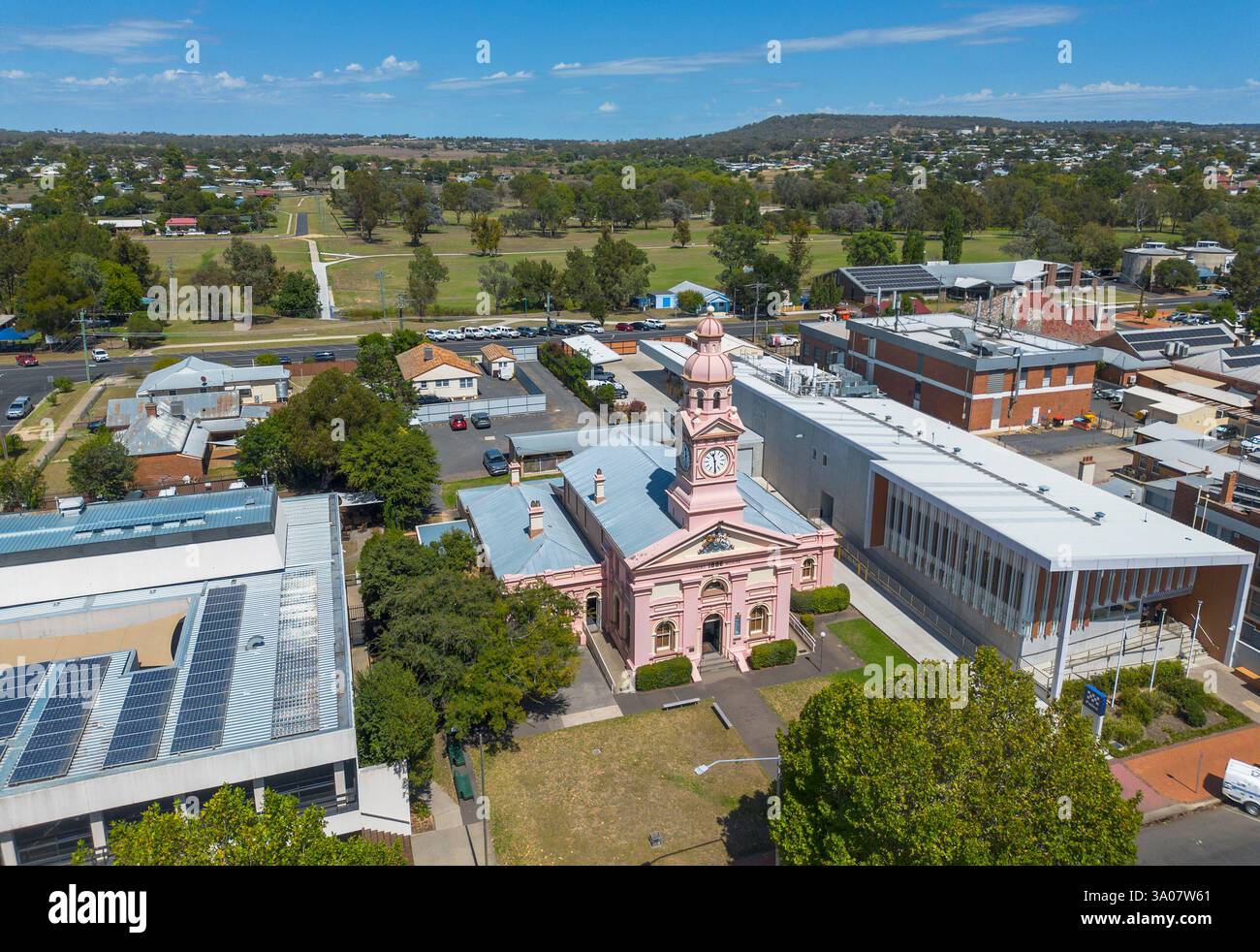 Aerial view of the old courthouse next to the modern Police station ...
