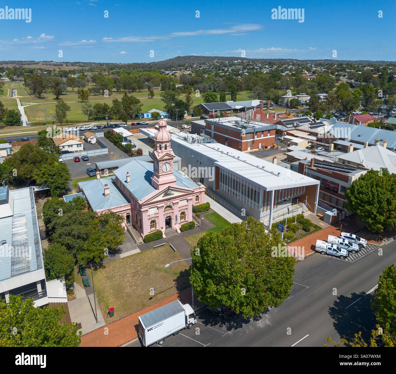 Aerial view of the old courthouse next to the modern Police station ...