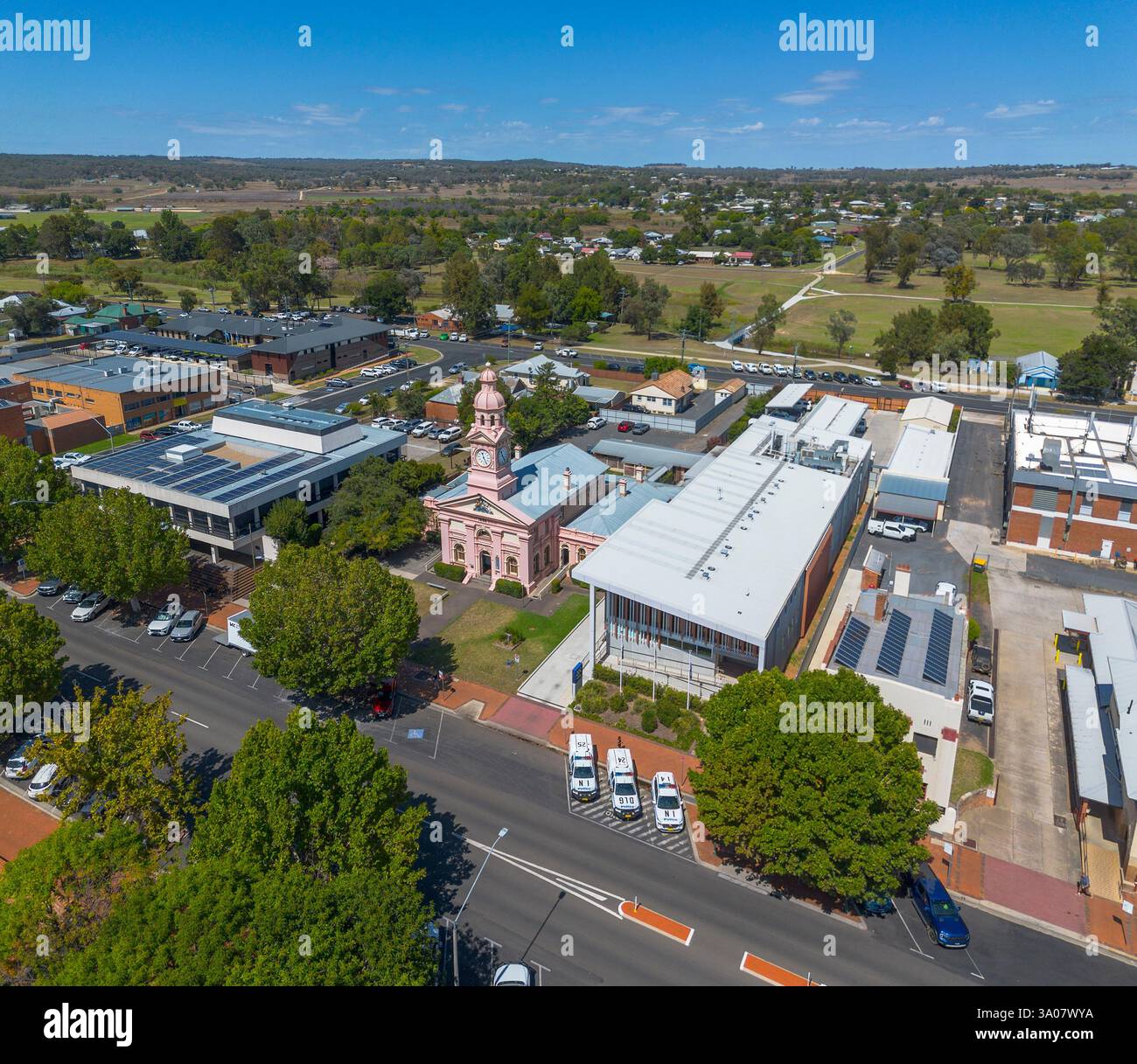 Aerial view of the old courthouse next to the modern Police station ...