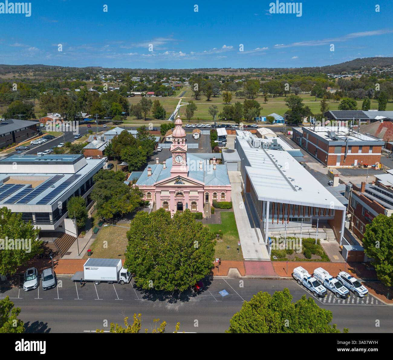 Aerial view of the old courthouse next to the modern Police station ...