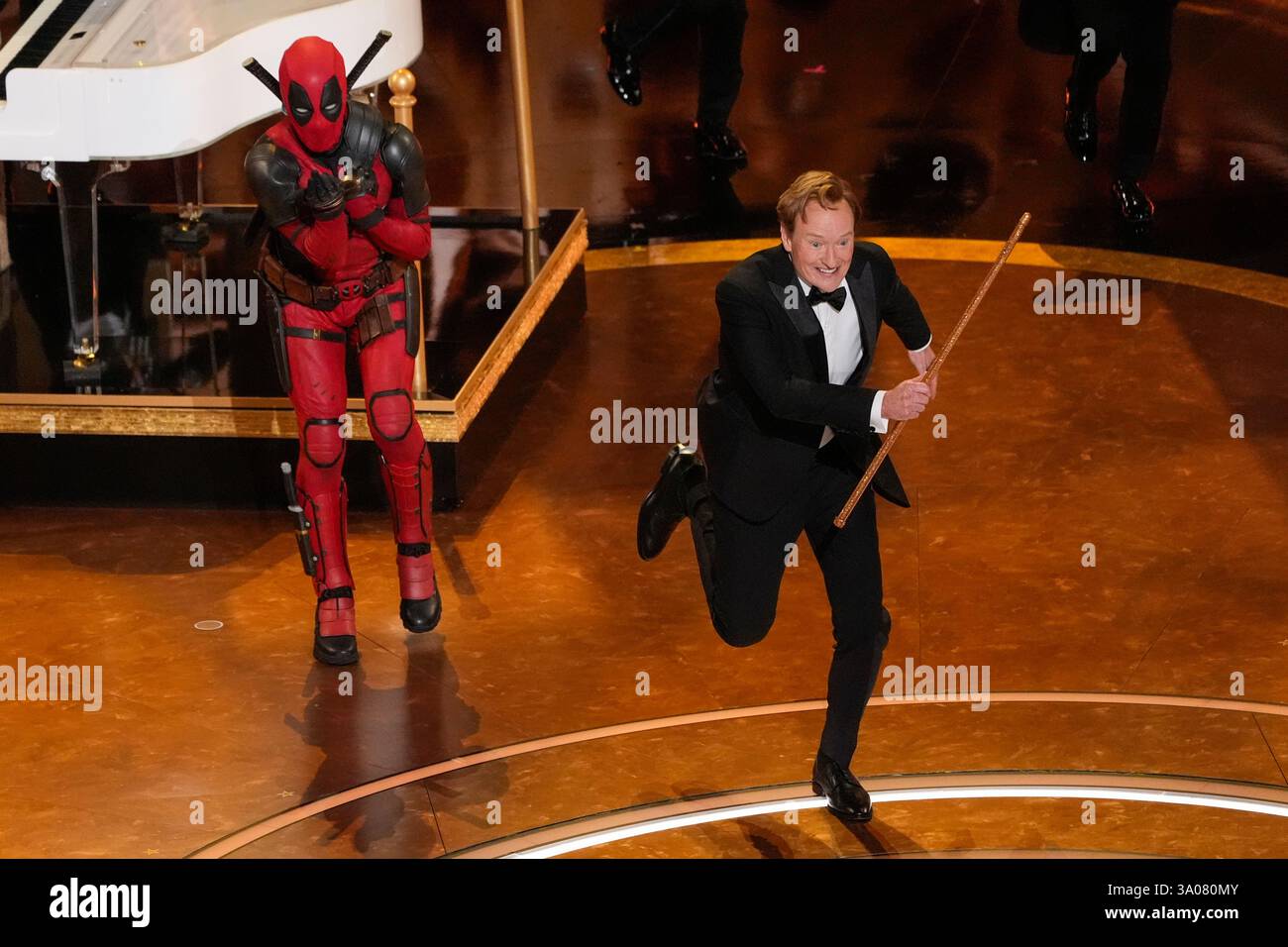 Dancing Deadpool, left, and Host Conan O'Brien perform during the ...