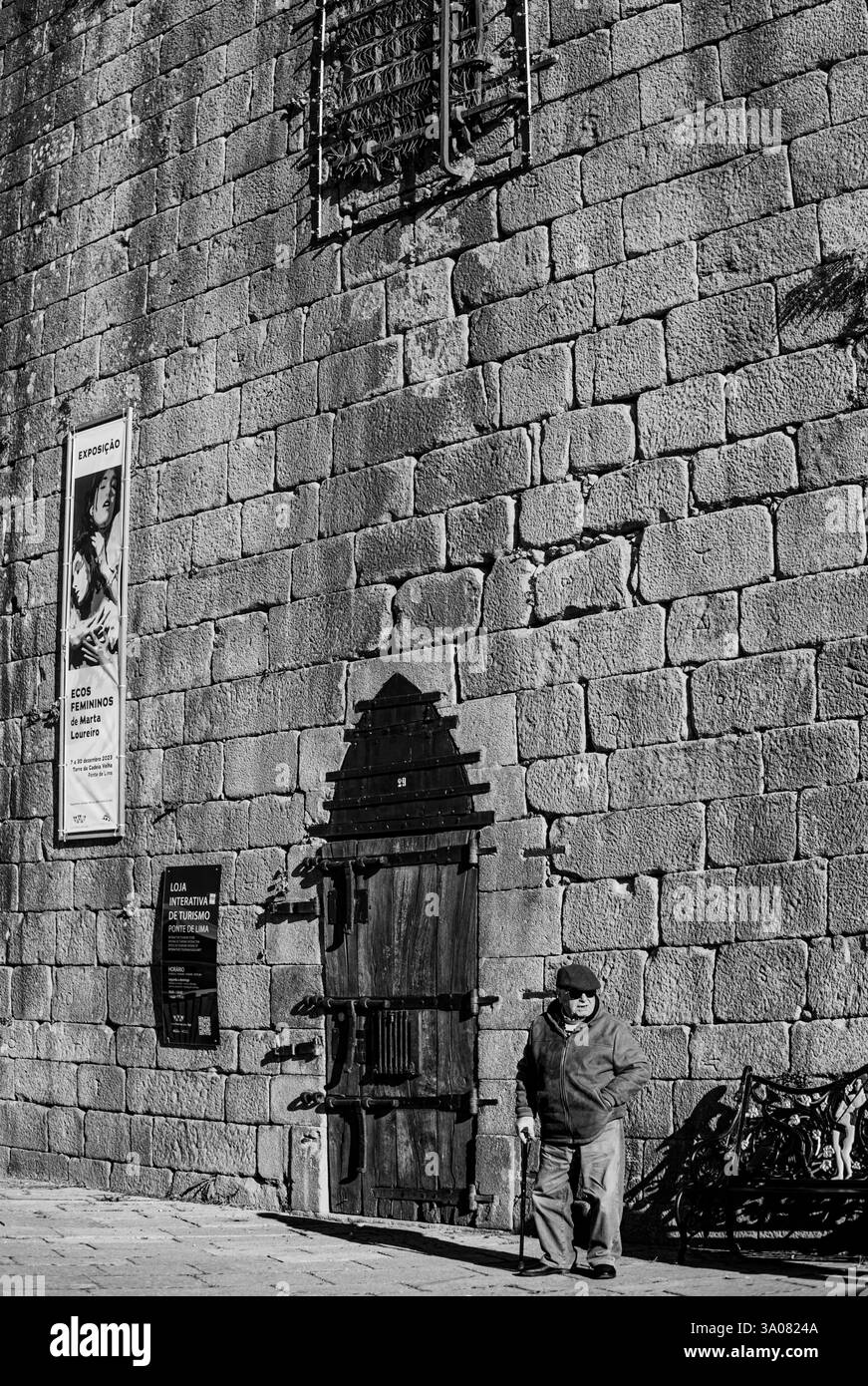 The Historic Torre da Cadeia Velha and an Elderly Man Passing by Its ...