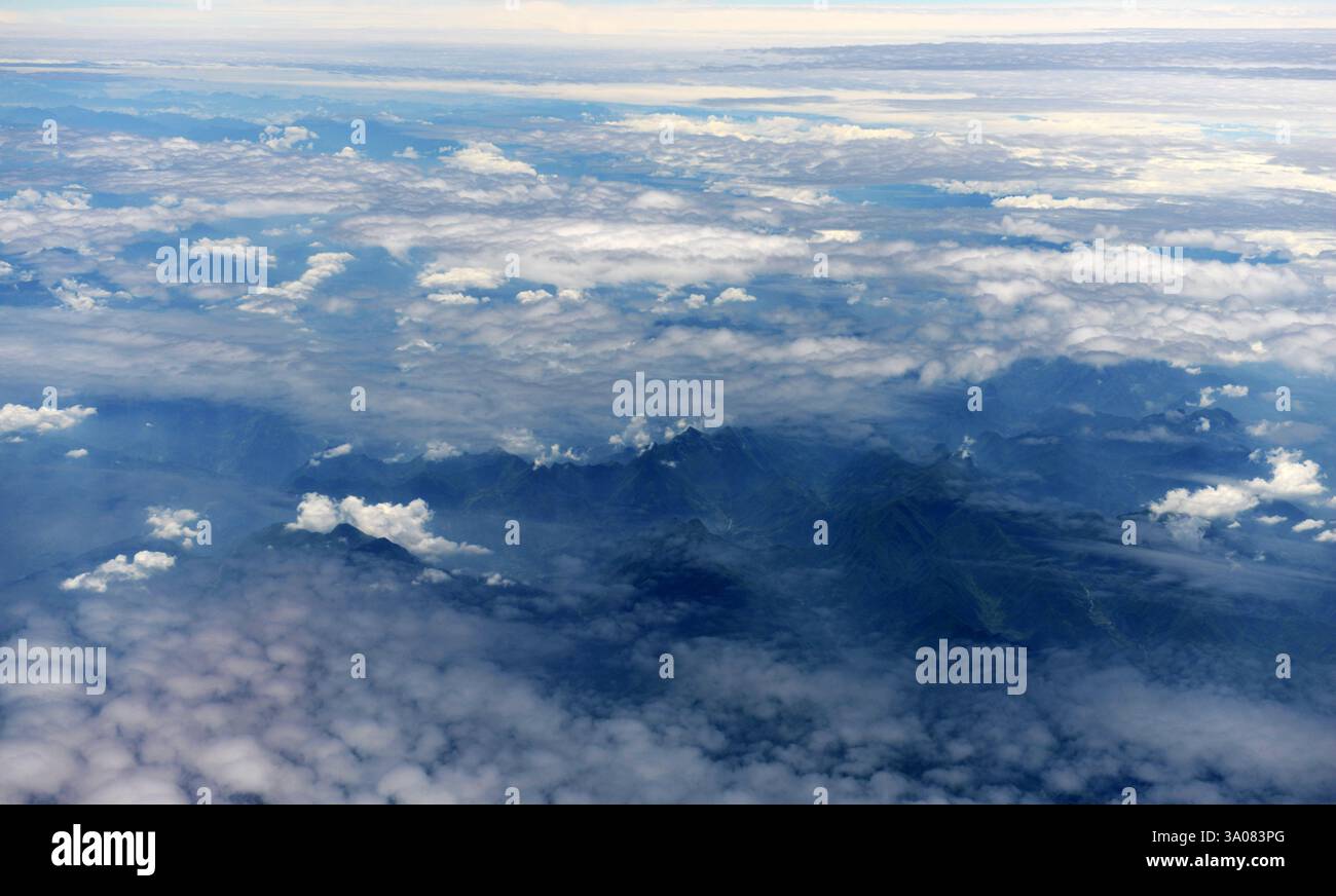 Aerial View of Endless Mountain Ranges Covered by Soft Hazy Layers ...