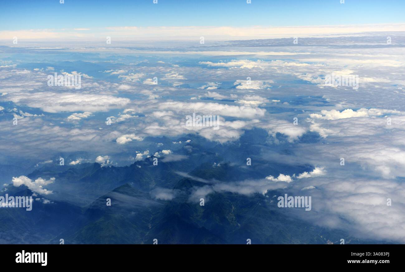 Aerial View of Endless Mountain Ranges Covered by Soft Hazy Layers ...