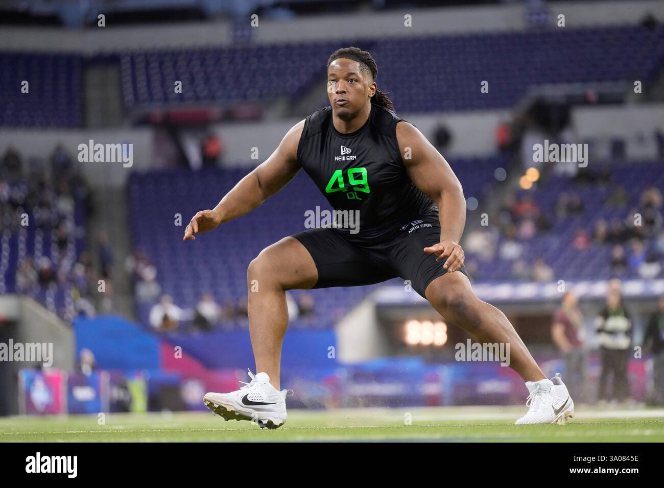 Georgia offensive lineman Jared Wilson runs a drill at the NFL football ...