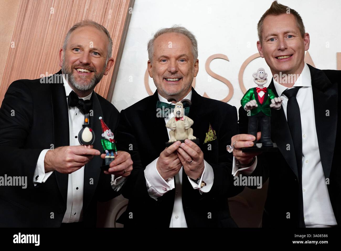 Richard Beek, from left, Nick Park, and Merlin Crossingham arrive at ...