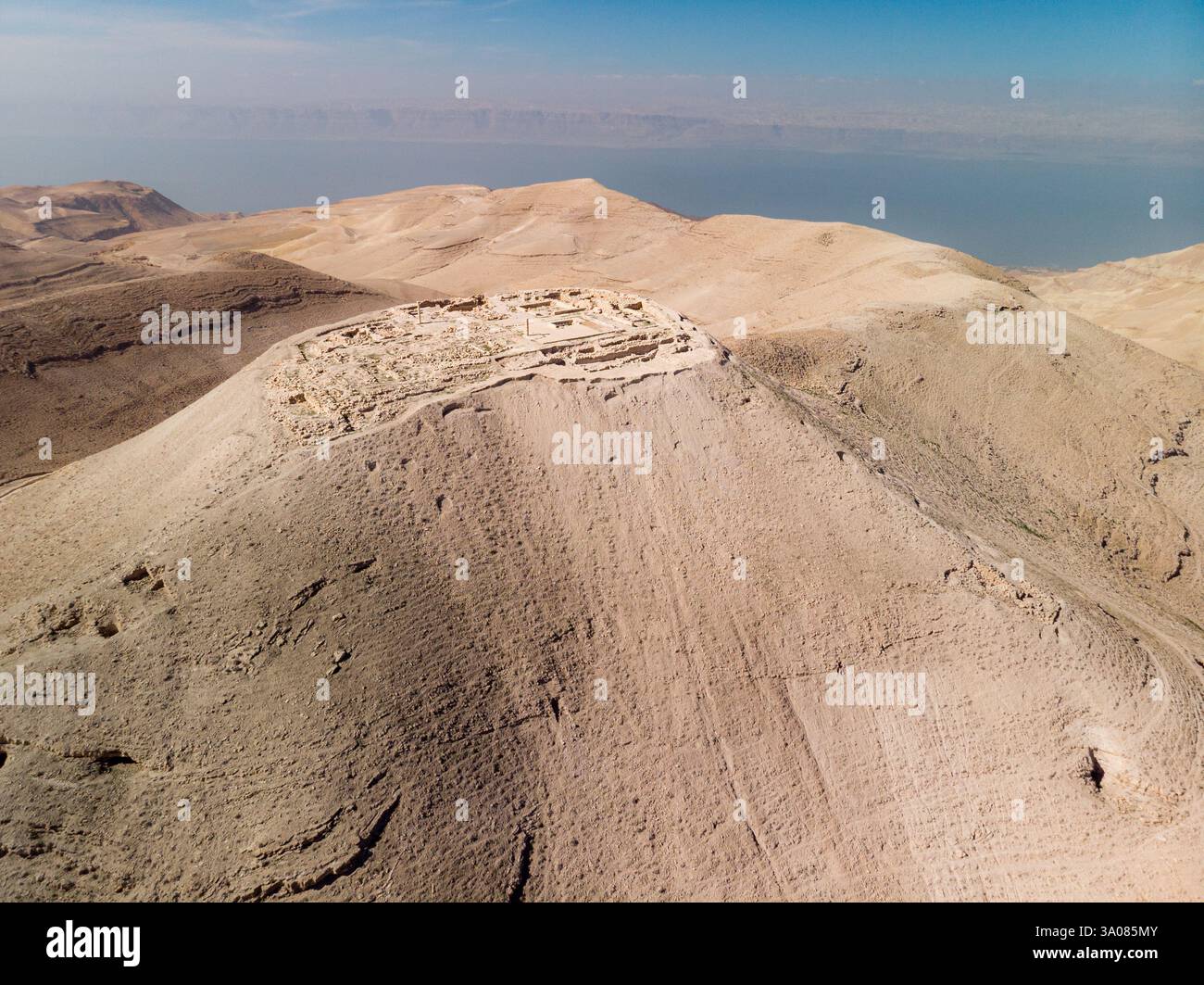 Aerial view of the Biblical city of Machaerus with the Dead Sea in the ...