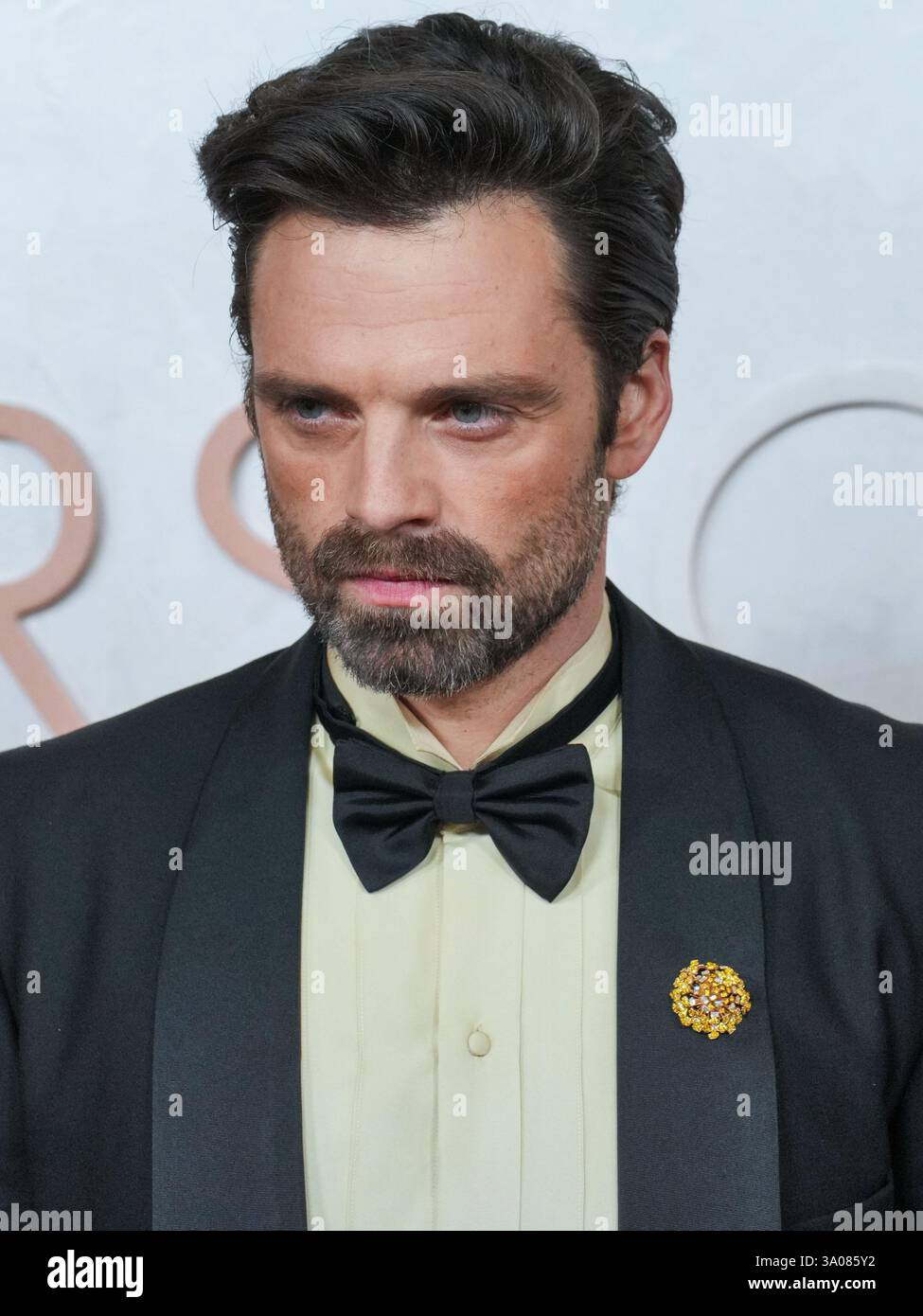 Sebastian Stan walking on the red carpet at the The 97th Academy Awards ...