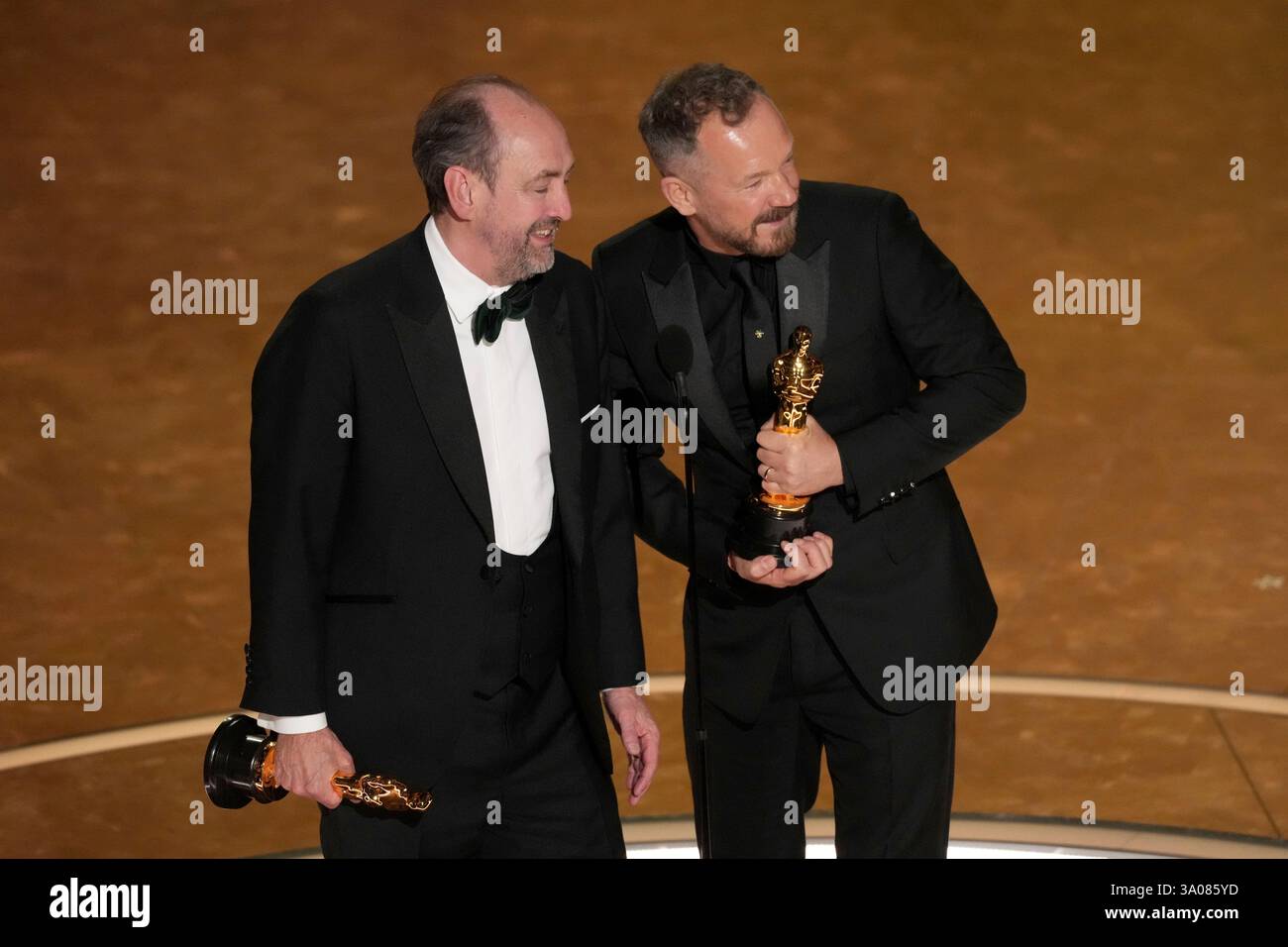 Nathan Crowley, left, and Lee Sandales accept the award for best ...