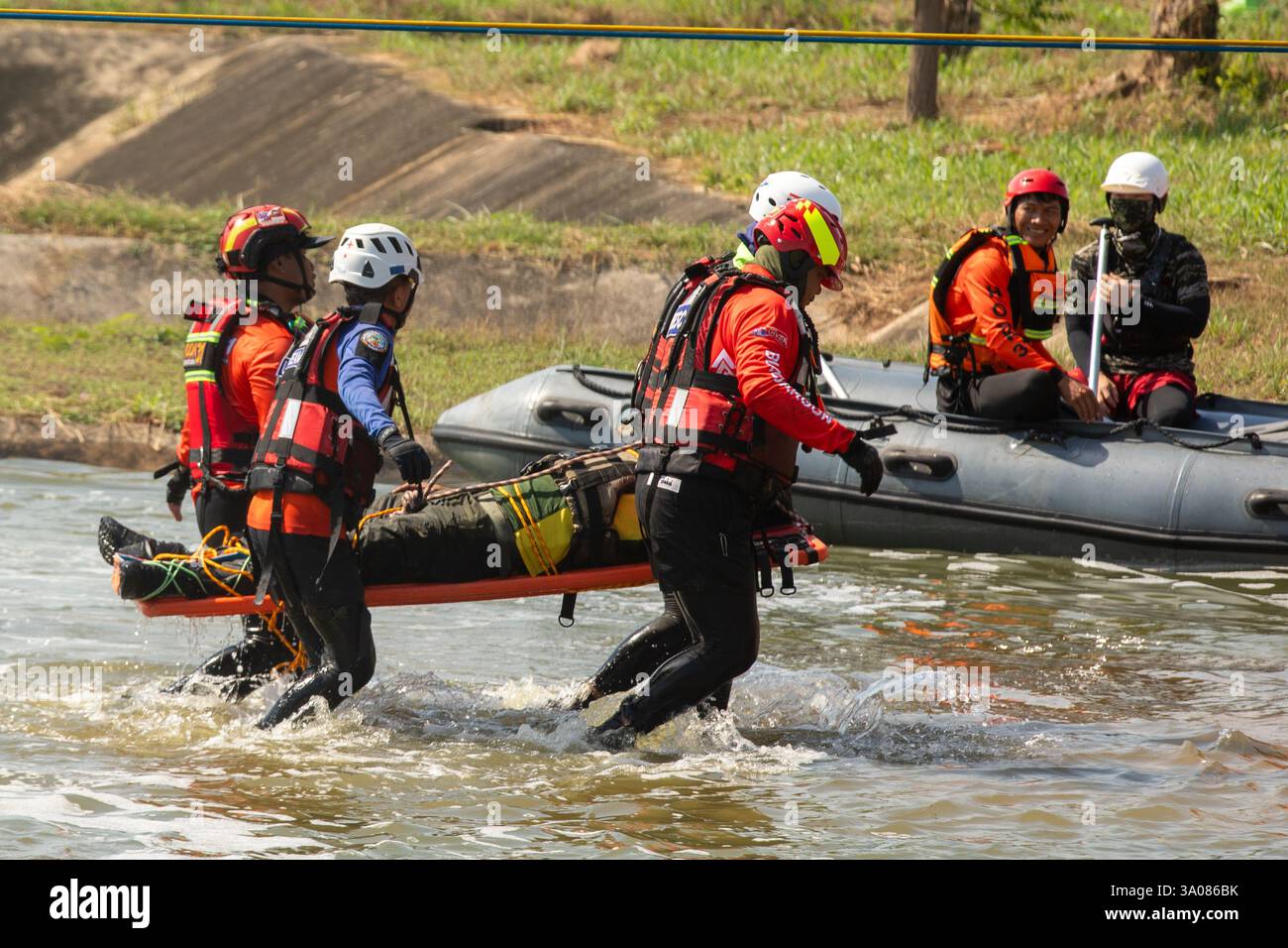 Team members from the Ruamkatanyu Foundation, a Thai disaster relief ...
