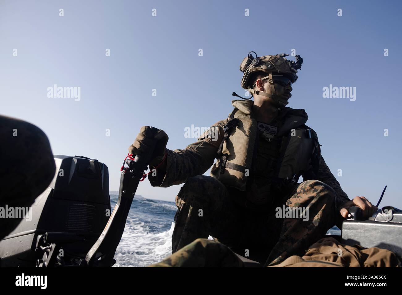 U.S. Marine Corps Cpl. Jared Gaitan, a coxswain with Battalion Landing ...