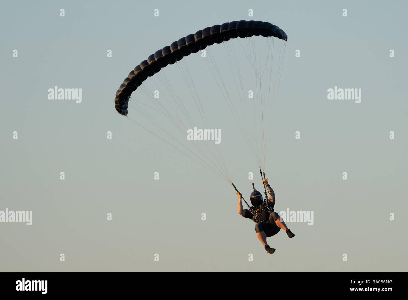 Sgt. 1st Class Logan Maples of the U.S. Army Parachute Team conducts an ...