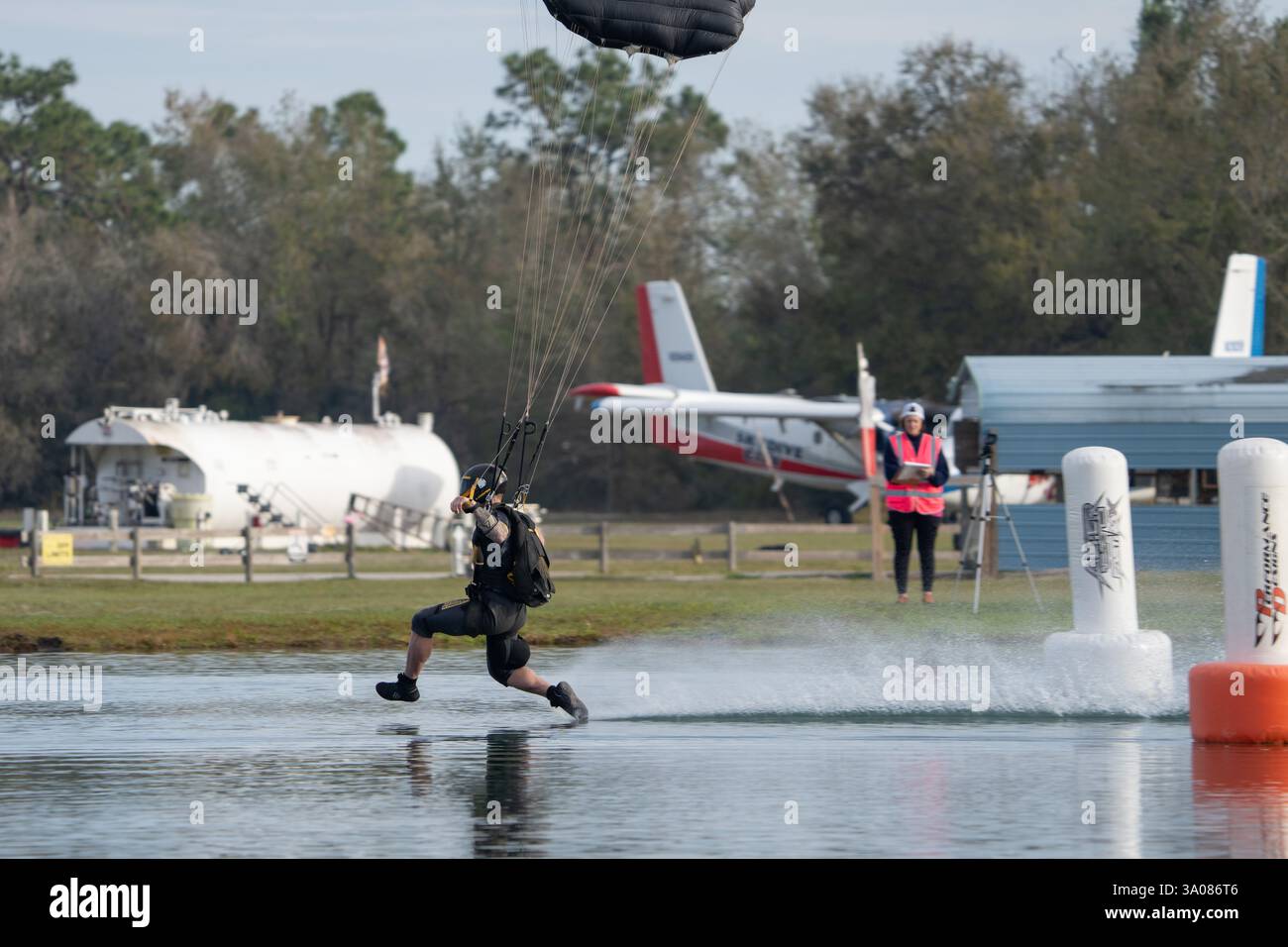 Sgt. 1st Class Logan Maples of the U.S. Army Parachute Team conducts an ...