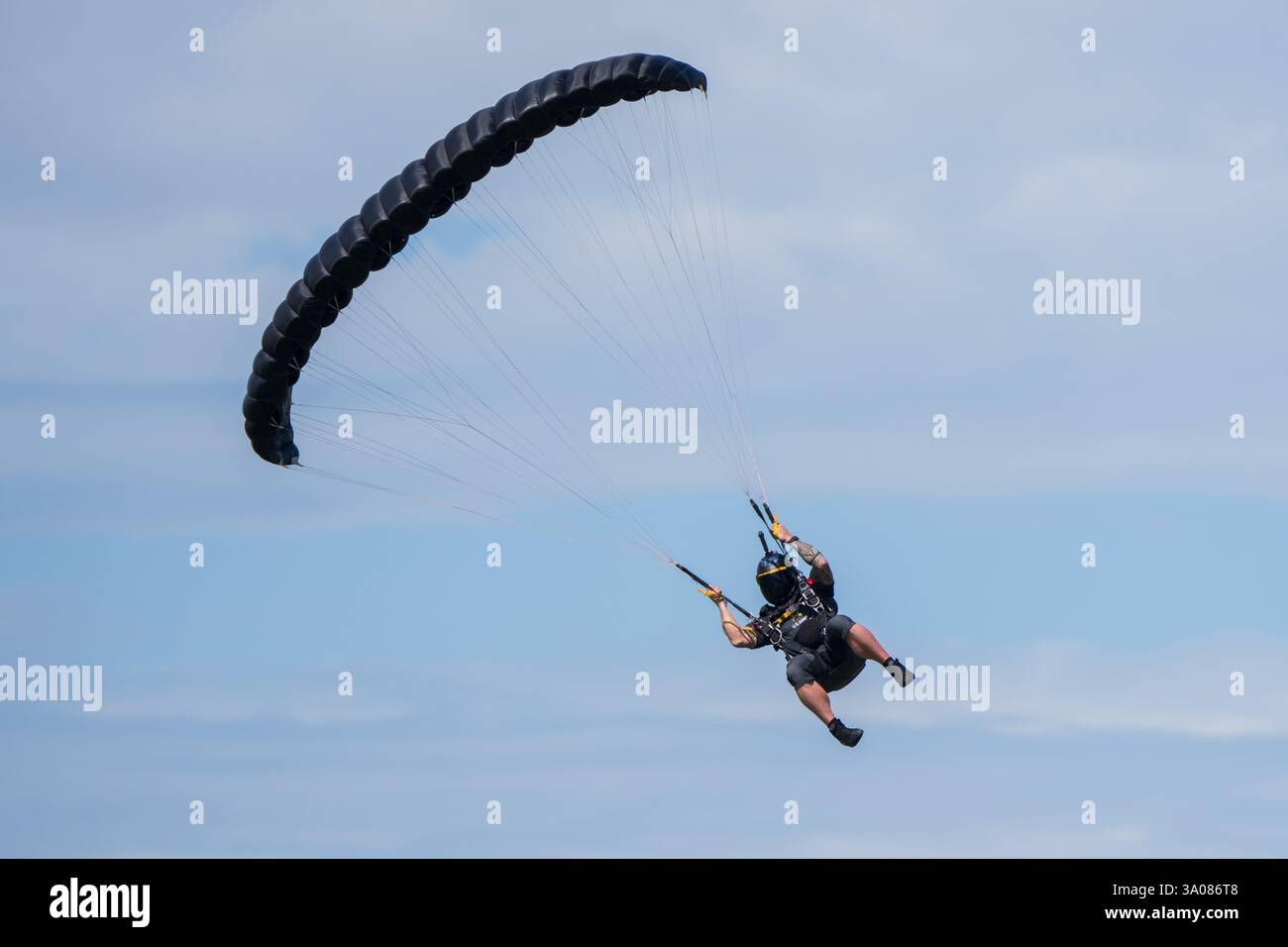 Sgt. 1st Class Logan Maples of the U.S. Army Parachute Team conducts an ...